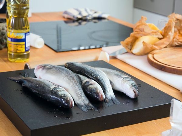 14 Ways To Get Rid Of Pesky Fish Smells In Your House After Cooking